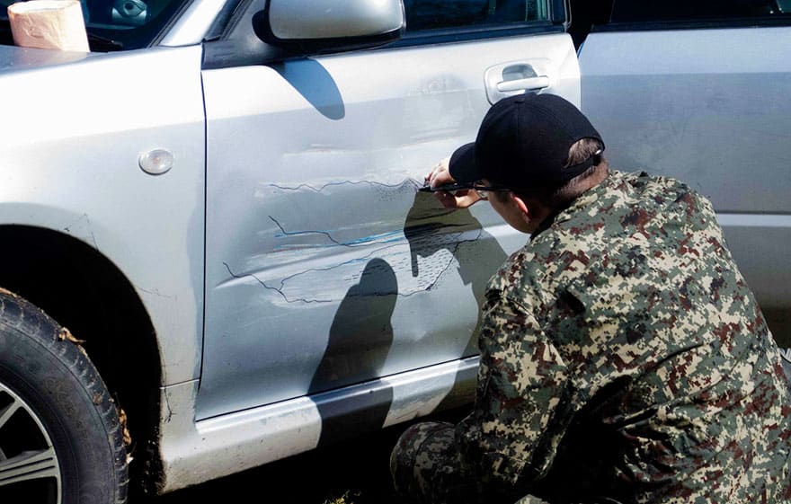 An incredible way to fix a car bump - with a painting!