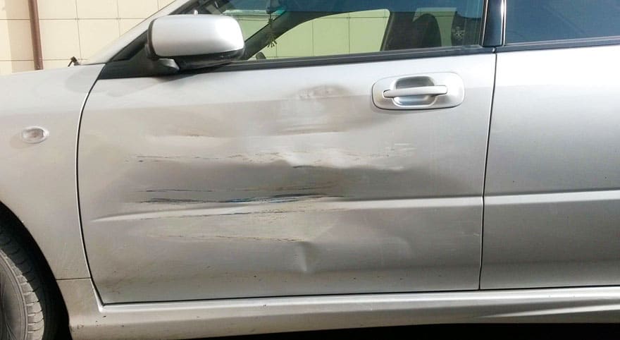 An incredible way to fix a car bump - with a painting!